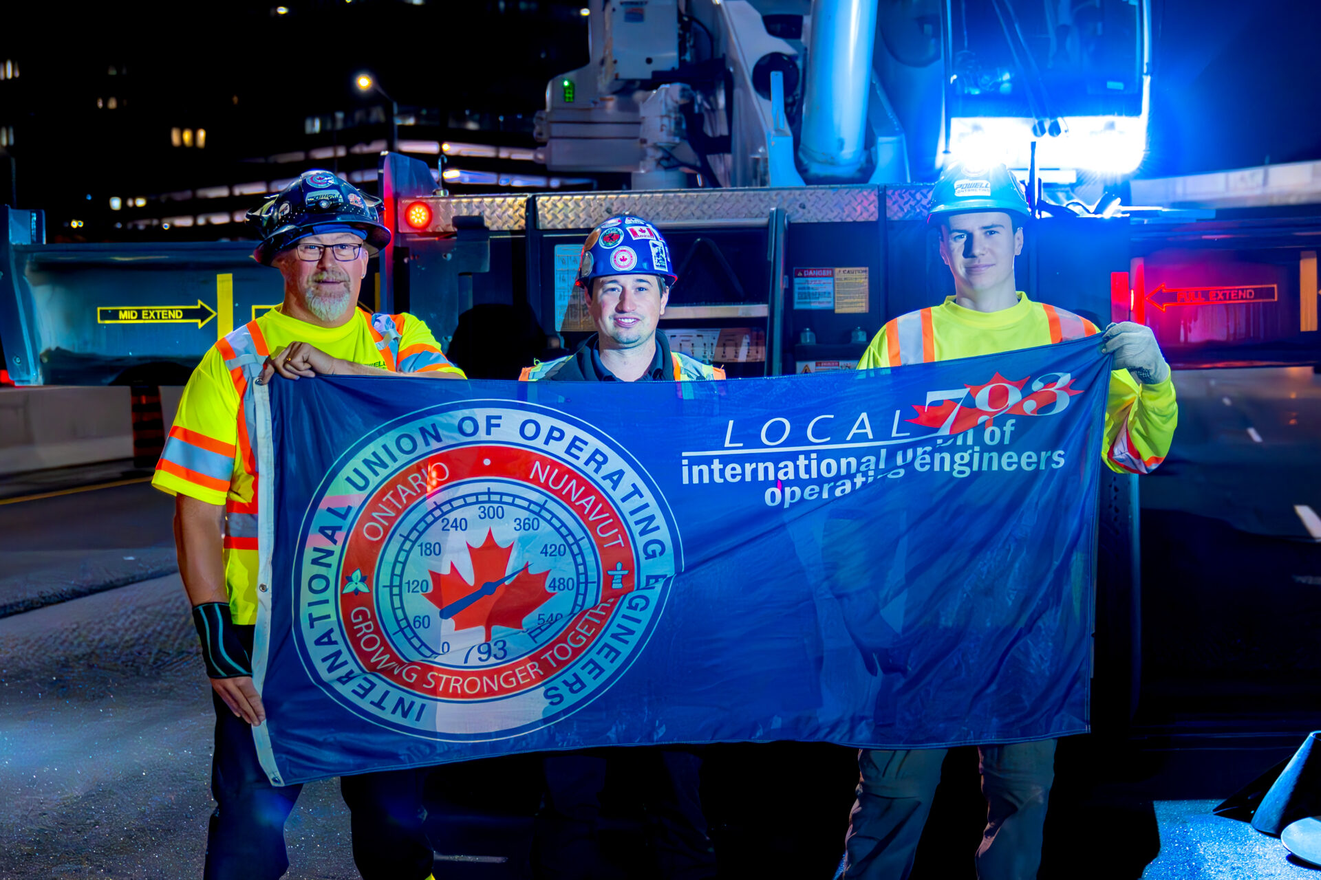 Local 793 Members Install Road Sign on QEW – IUOE Local 793